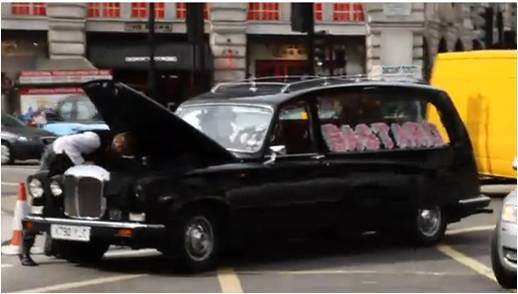 Broken down hearse at Piccadilly Circus - The Poke