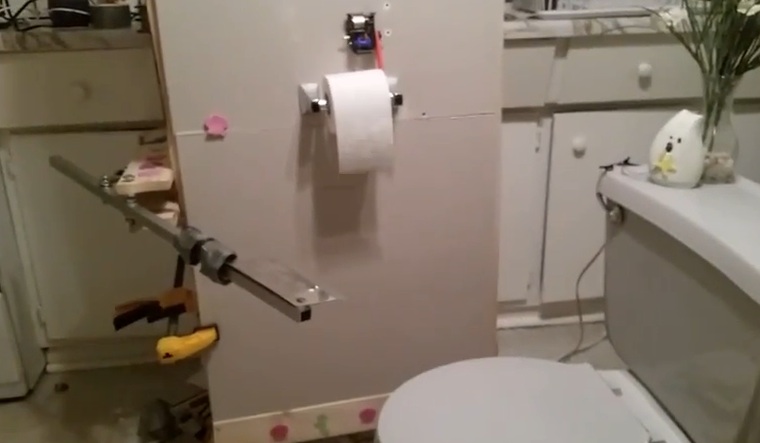 The World's Most Useless (And Dangerous) Toilet Paper Dispenser - The Poke