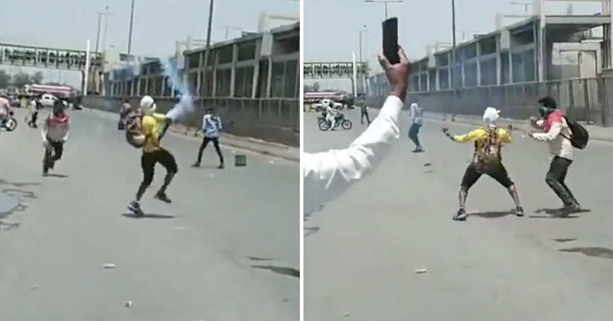 Just a guy catching a tear gas shell mid air and throwing it right back ...